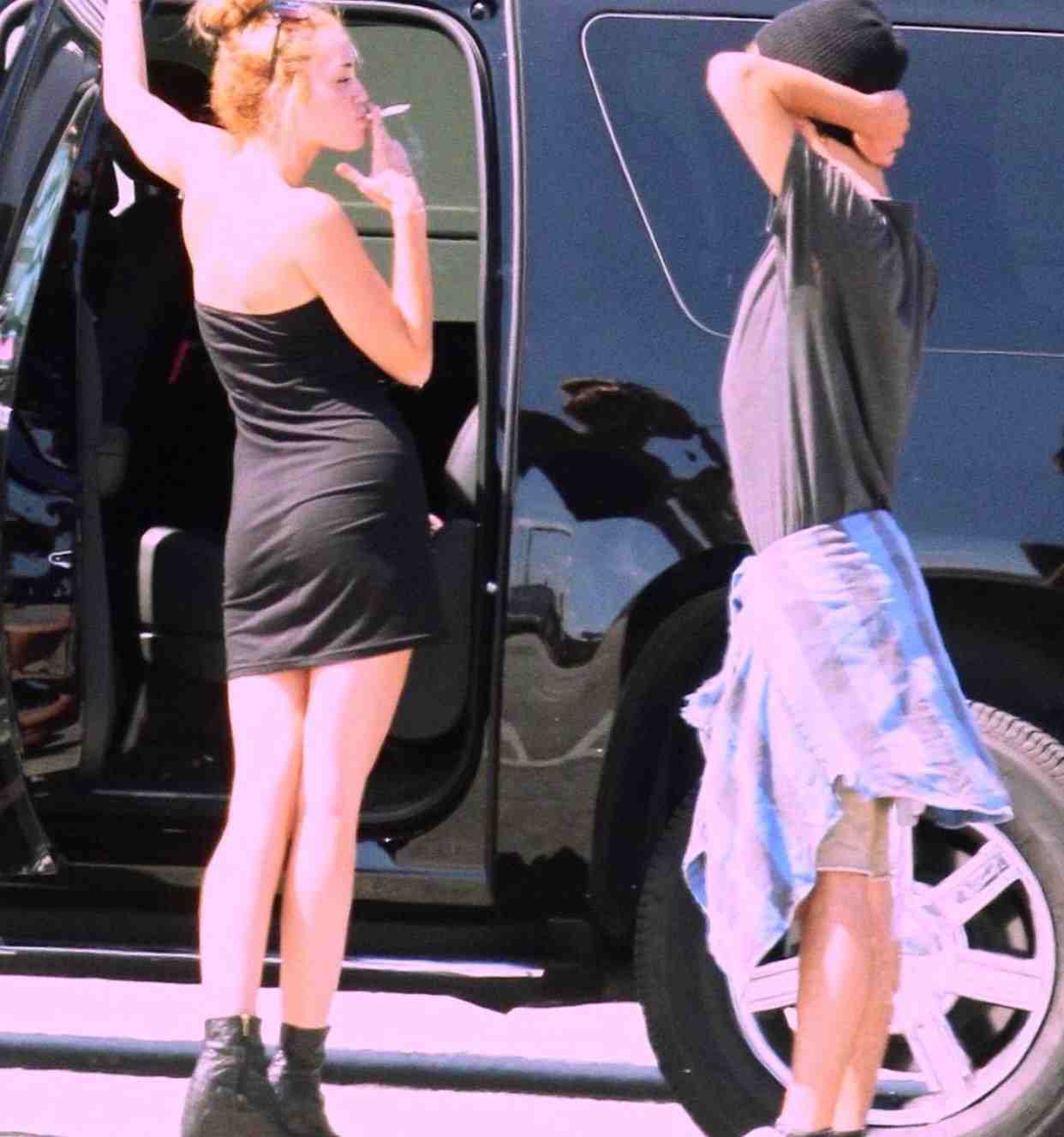Miley Cyrus Posts Rebellious Photos stating that “Smoking Is Injurious ...